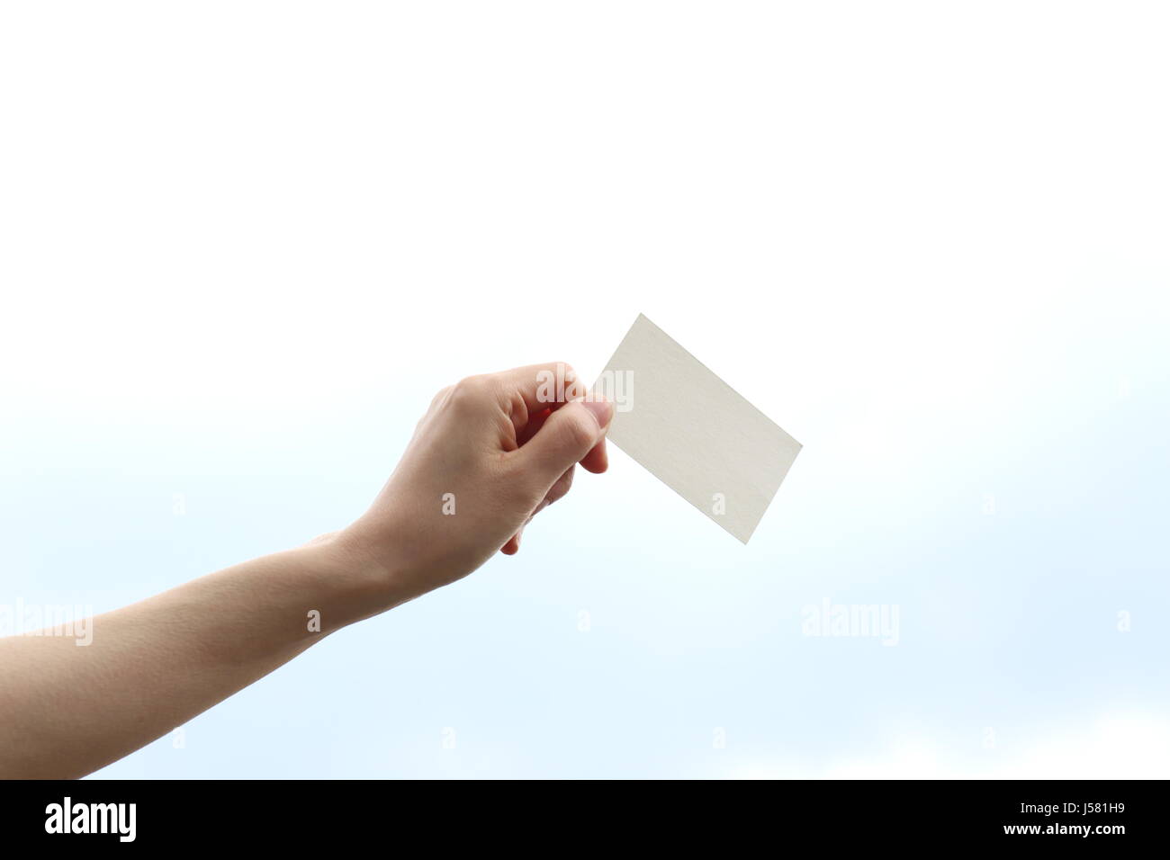 Woman Hand Holding Card Stock Photo - Alamy