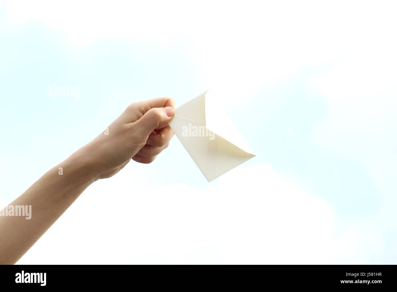 Woman Hand Holding Envelope Stock Photo - Alamy