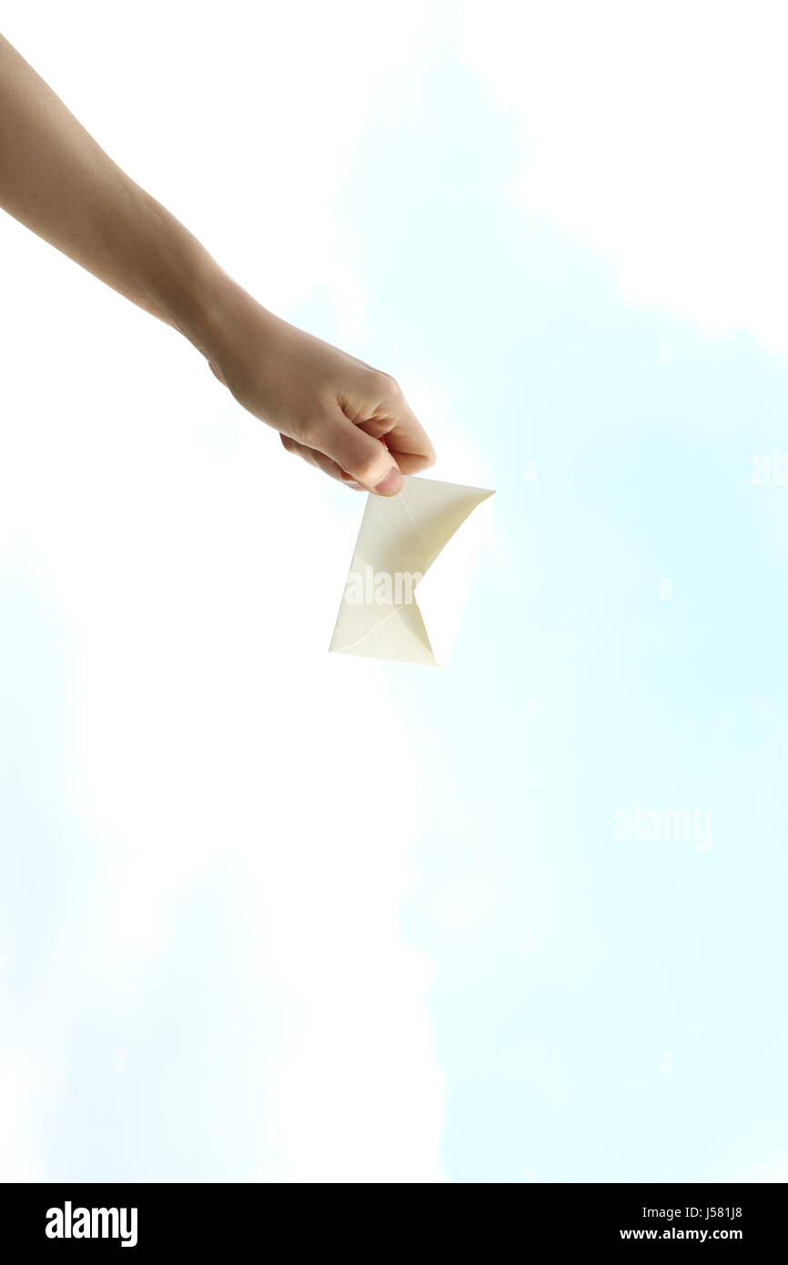 Woman Hand Holding Envelope Stock Photo - Alamy