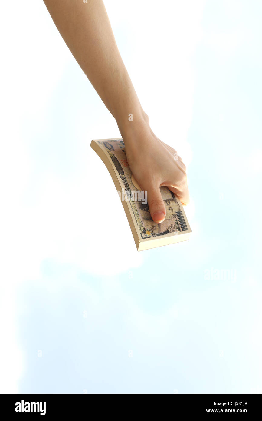 Hand holding money hi-res stock photography and images - Alamy