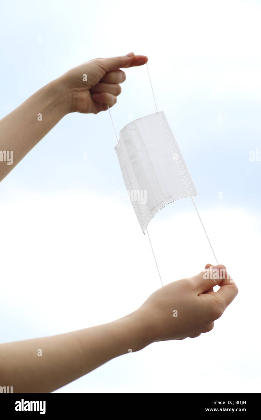 Woman Hand Holding Mask Stock Photo - Alamy