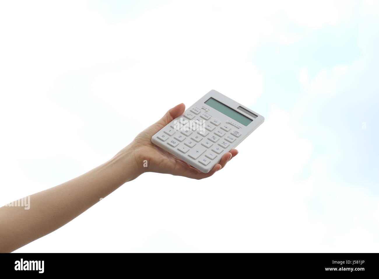 Woman Hand Holding Calculator Stock Photo - Alamy