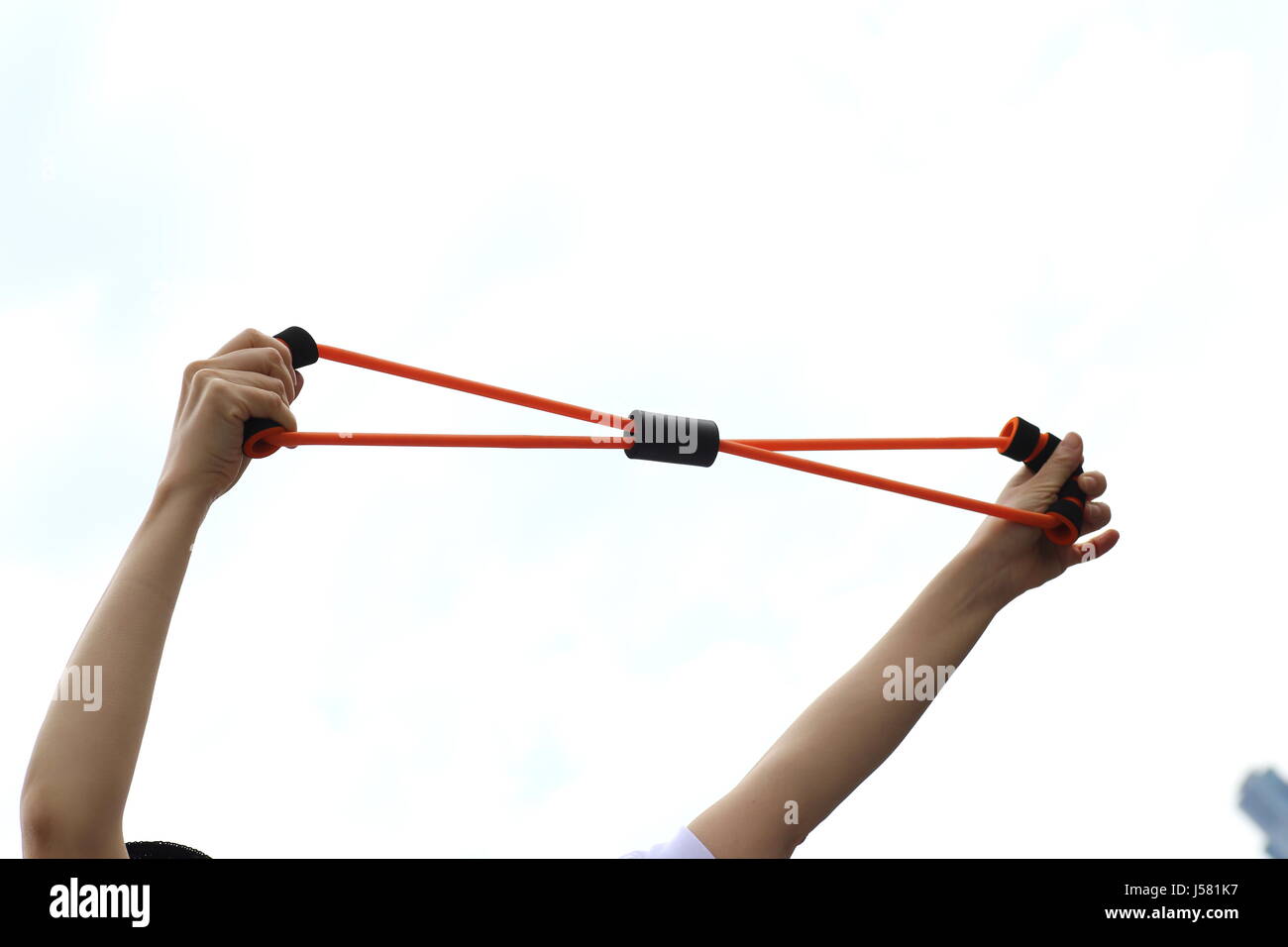 Woman Hand Exercise Band Stock Photo - Alamy