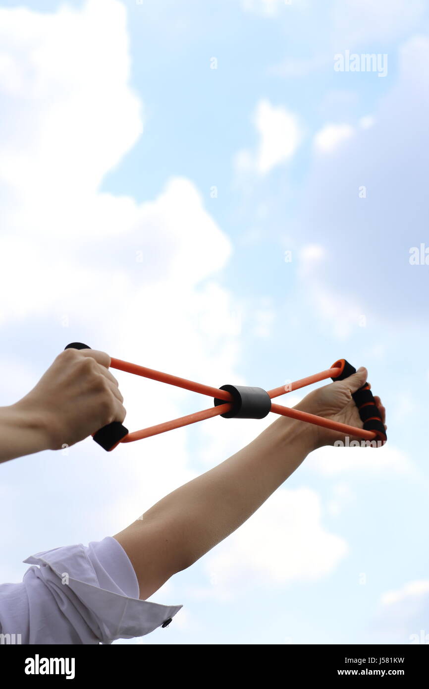 Woman Hand Exercise Band Stock Photo - Alamy