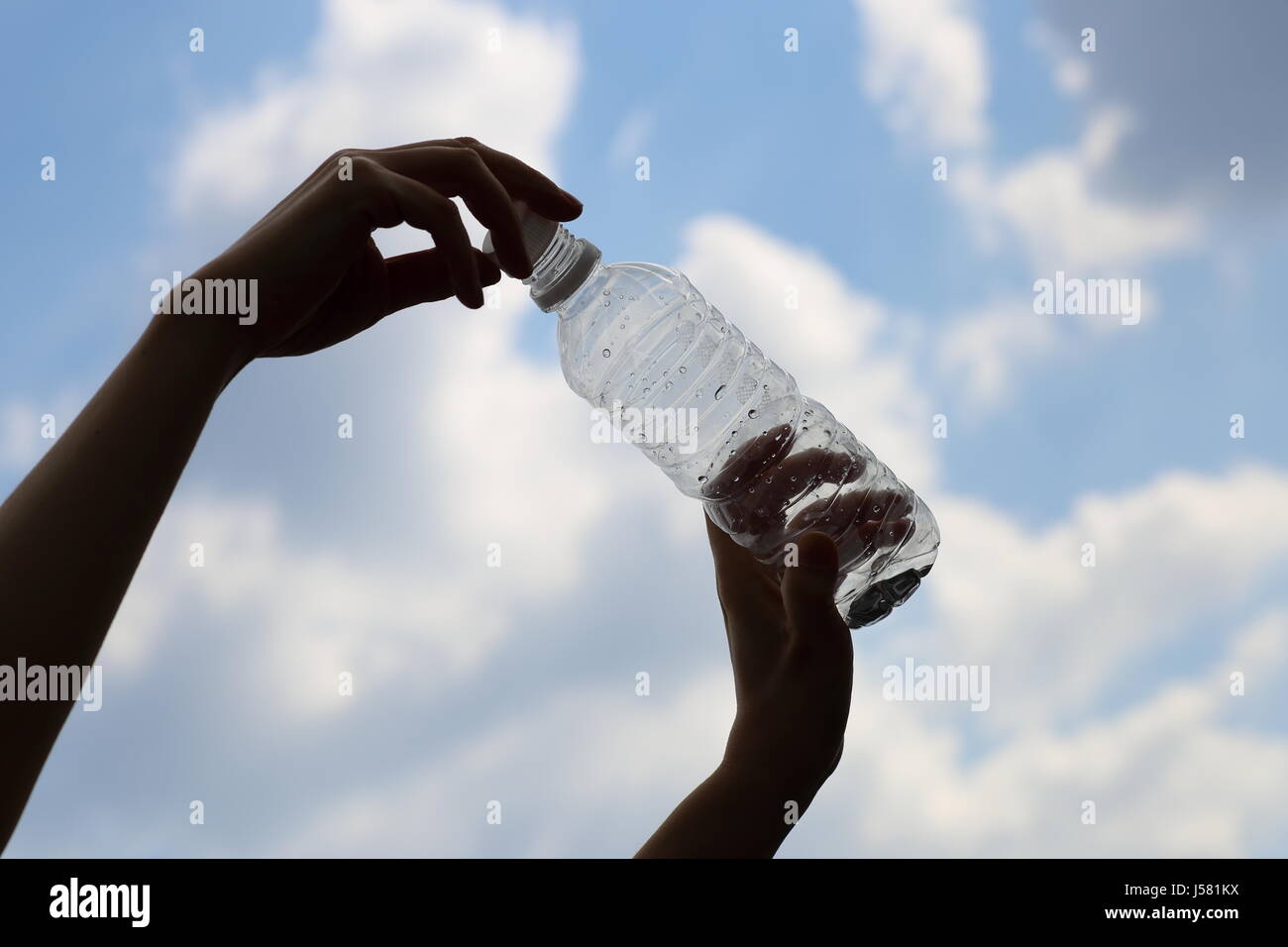 Woman Hand Holding Pitcher Stock Photo - Alamy