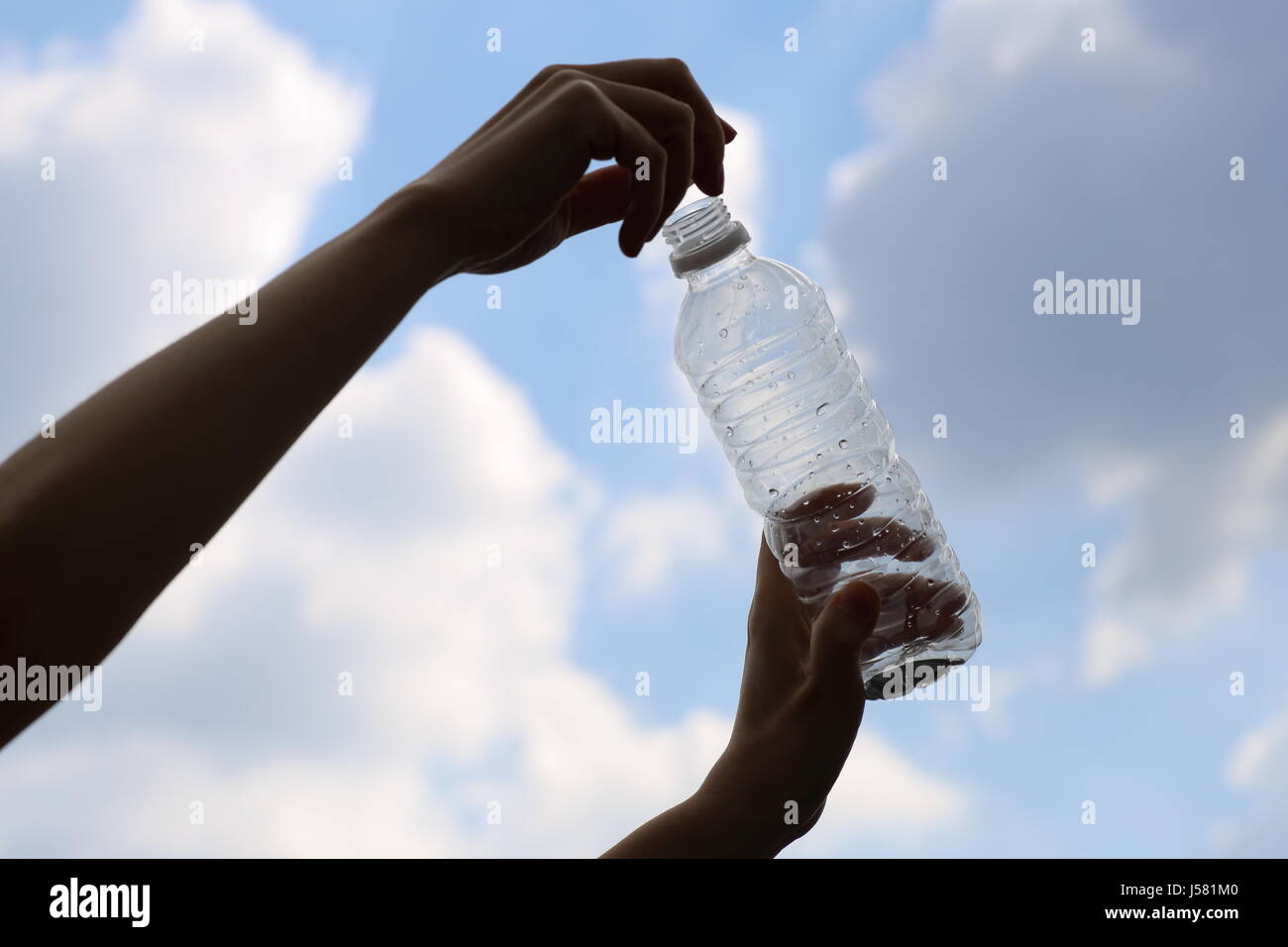 Woman Hand Holding Pitcher Stock Photo - Alamy