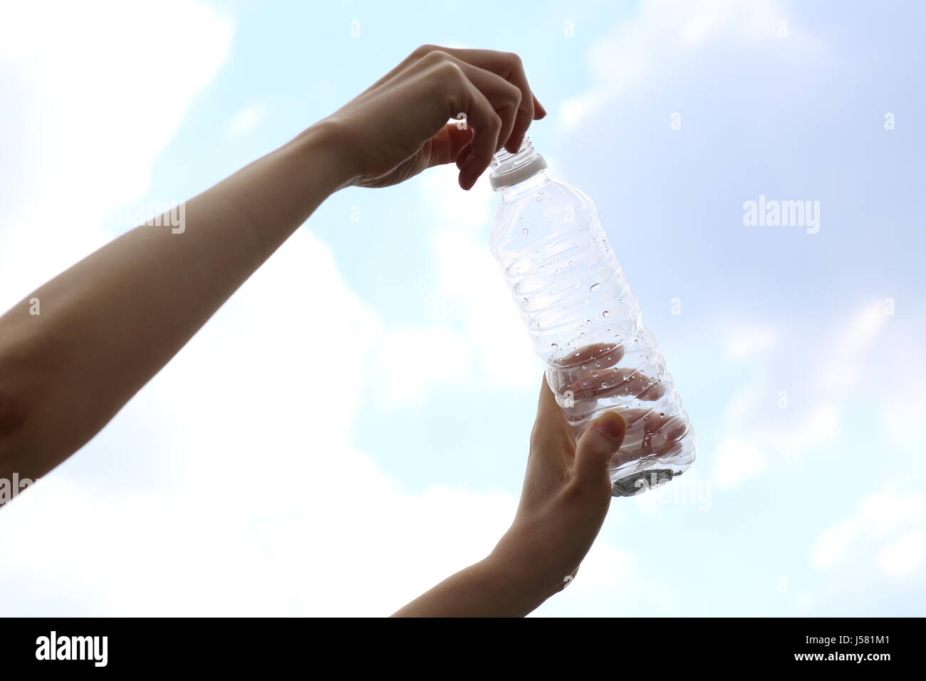 Woman Hand Holding Pitcher Stock Photo - Alamy