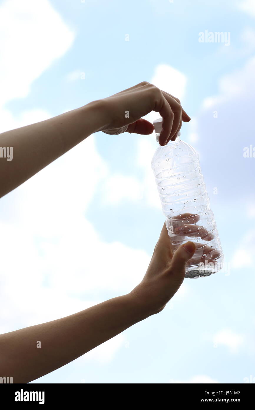 Woman Hand Holding Pitcher Stock Photo - Alamy