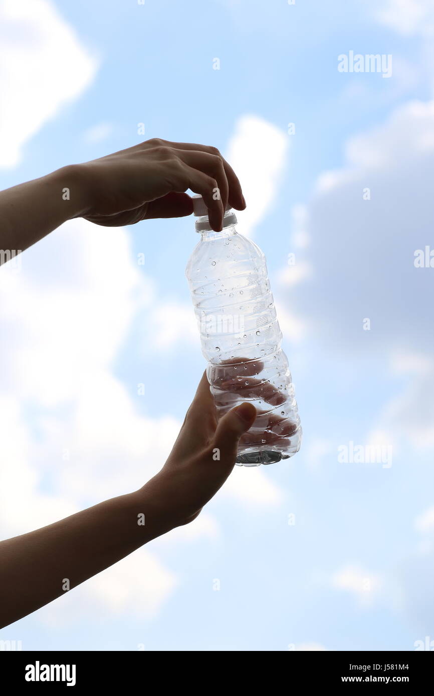 Woman Hand Holding Pitcher Stock Photo - Alamy