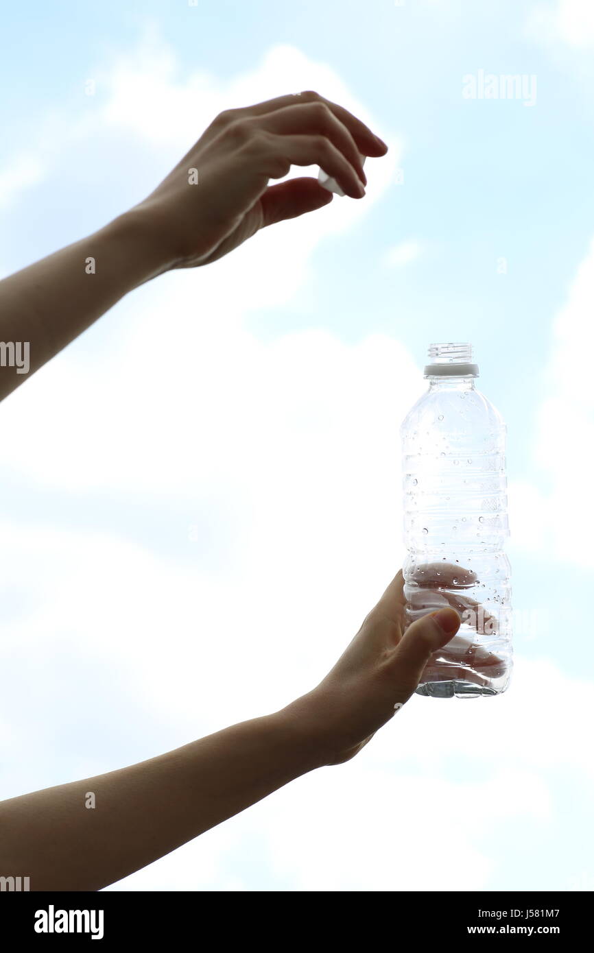 Woman Hand Holding Pitcher Stock Photo - Alamy