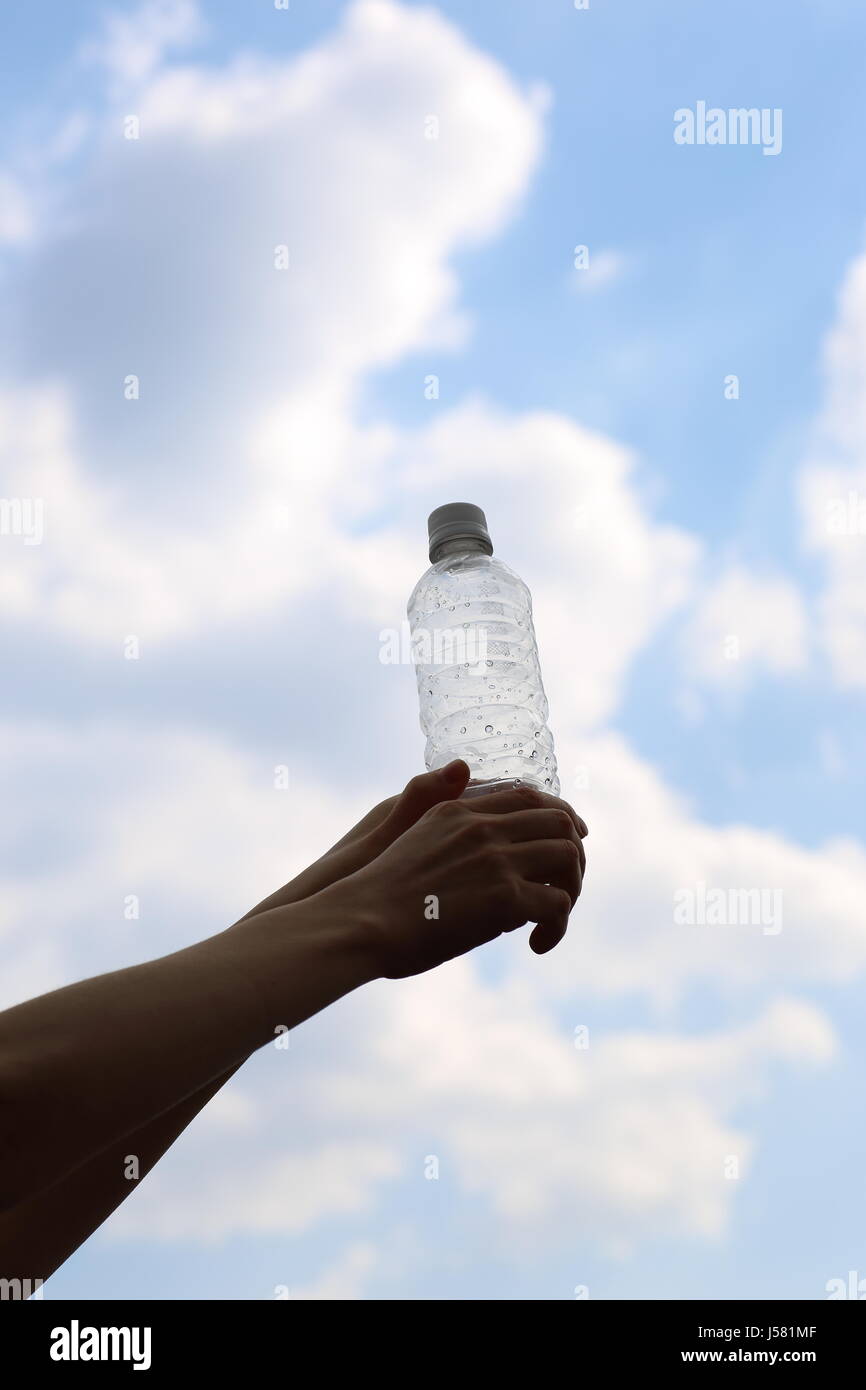 Woman Hand Holding Pitcher Stock Photo - Alamy