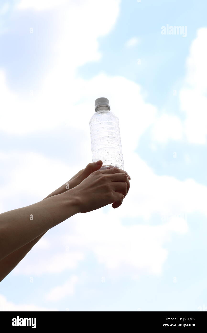 Woman Hand Holding Pitcher Stock Photo - Alamy