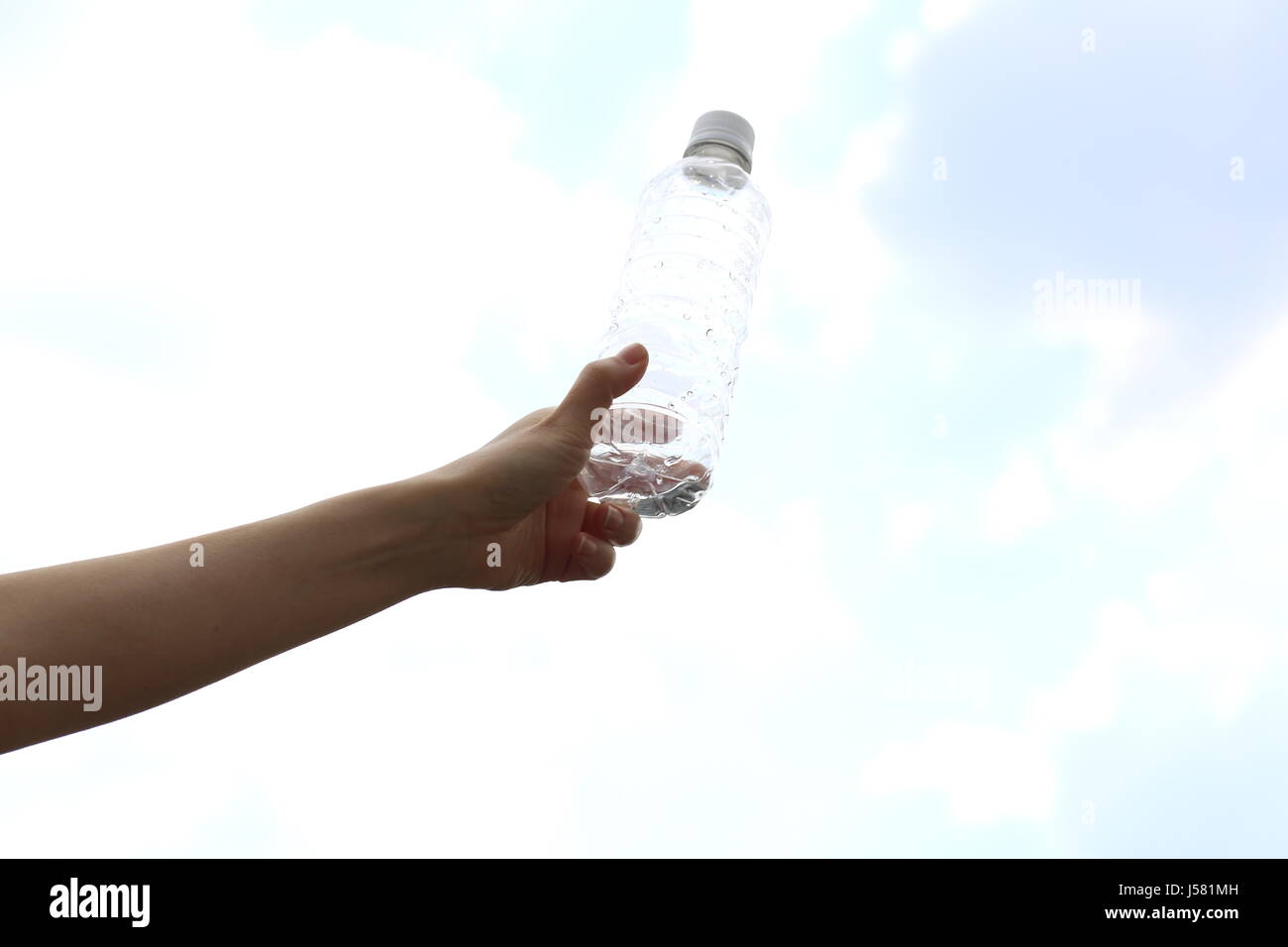 Woman Hand Holding Pitcher Stock Photo - Alamy