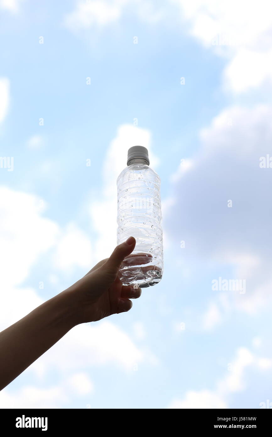 Woman Hand Holding Pitcher Stock Photo - Alamy