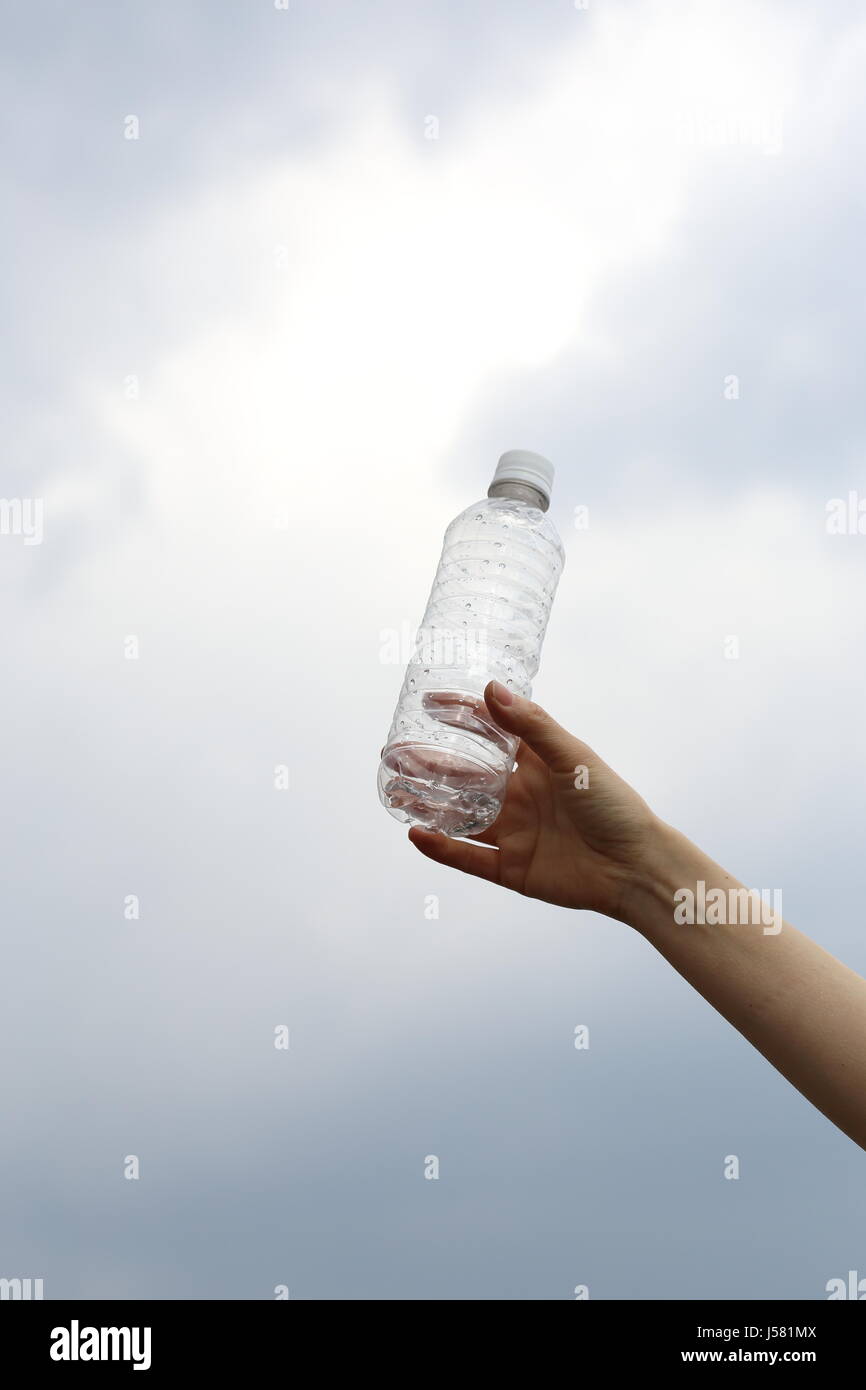 Woman Hand Holding Pitcher Stock Photo - Alamy