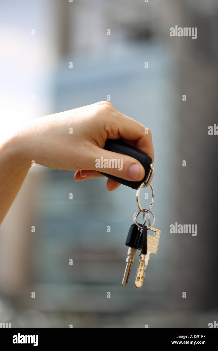 Woman Hand Holding Key Stock Photo - Alamy
