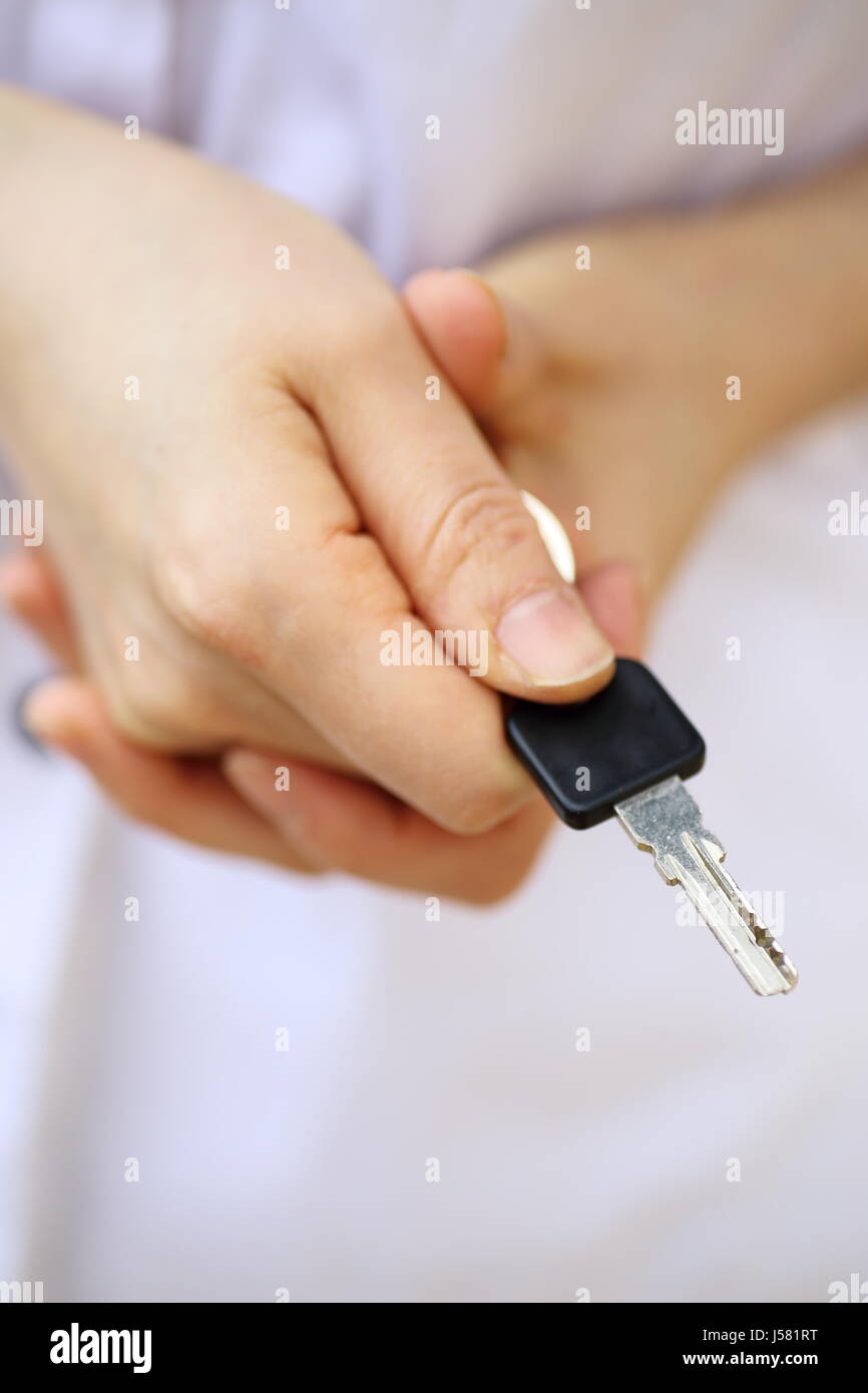 Woman Hand Holding Key Stock Photo - Alamy