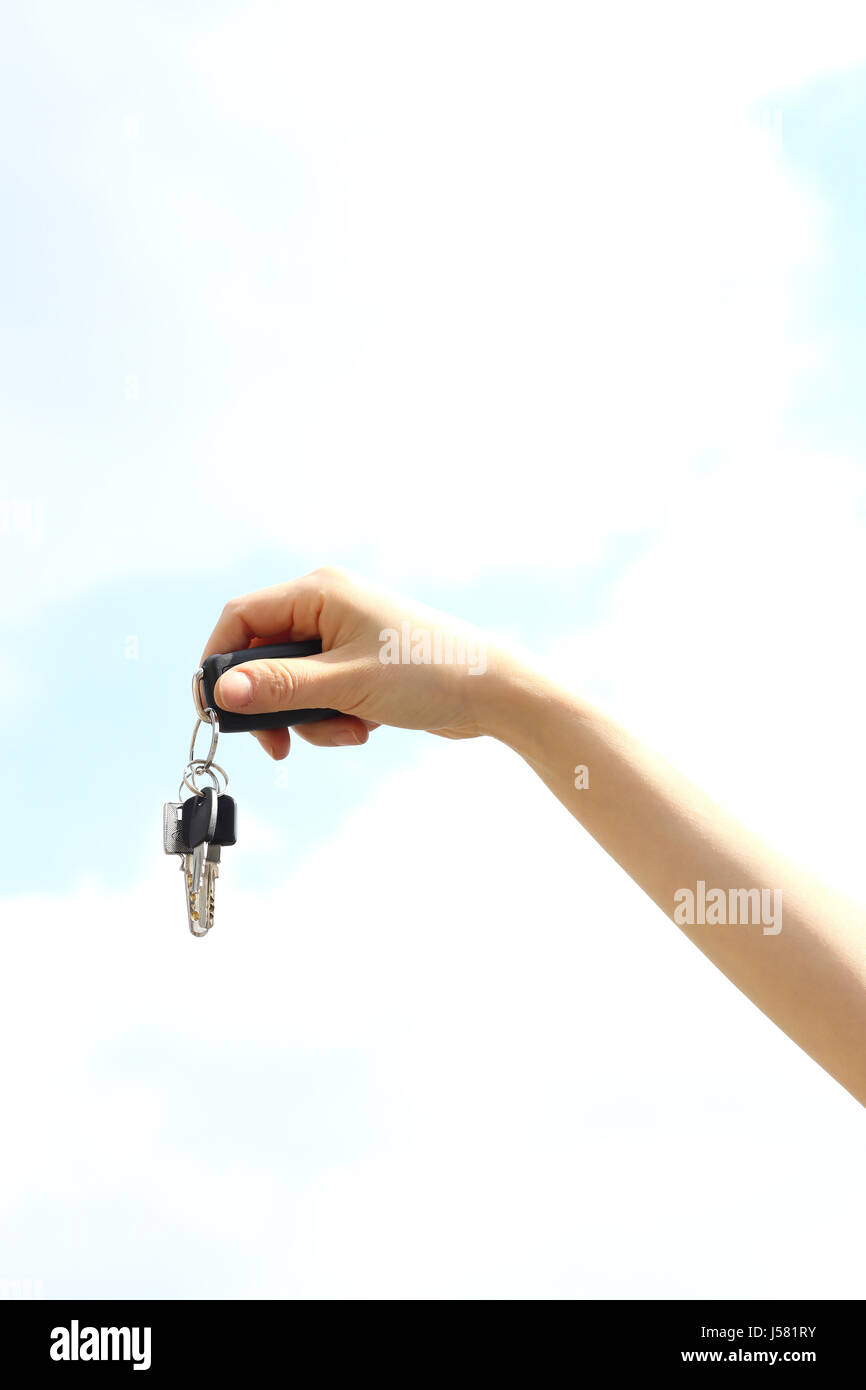Woman Hand Holding Key Stock Photo - Alamy