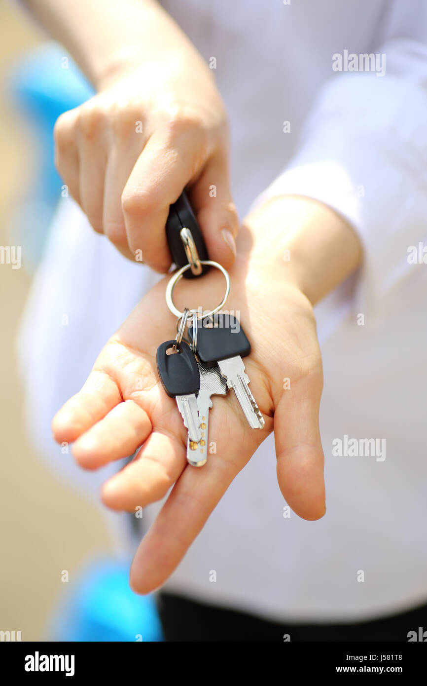Woman Hand Holding Key Stock Photo - Alamy