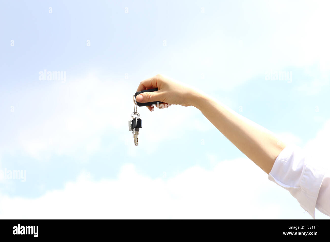 Woman Hand Holding Key Stock Photo - Alamy