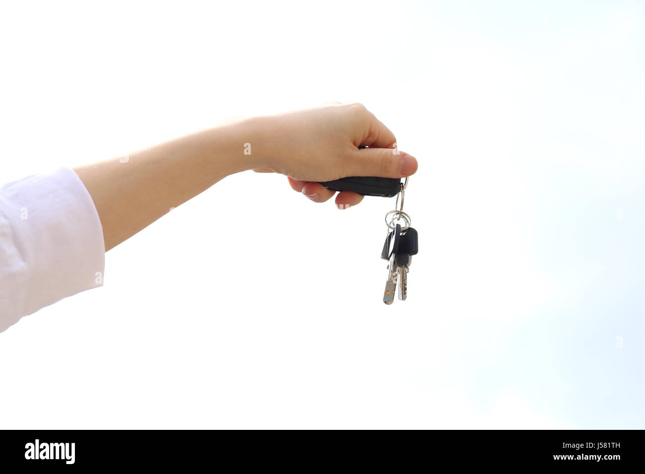 Woman Hand Holding Key Stock Photo - Alamy