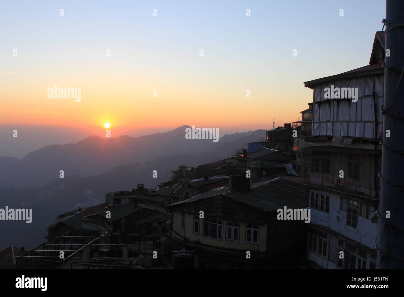 Sunset over Shimla north India with hills in the background Stock Photo ...