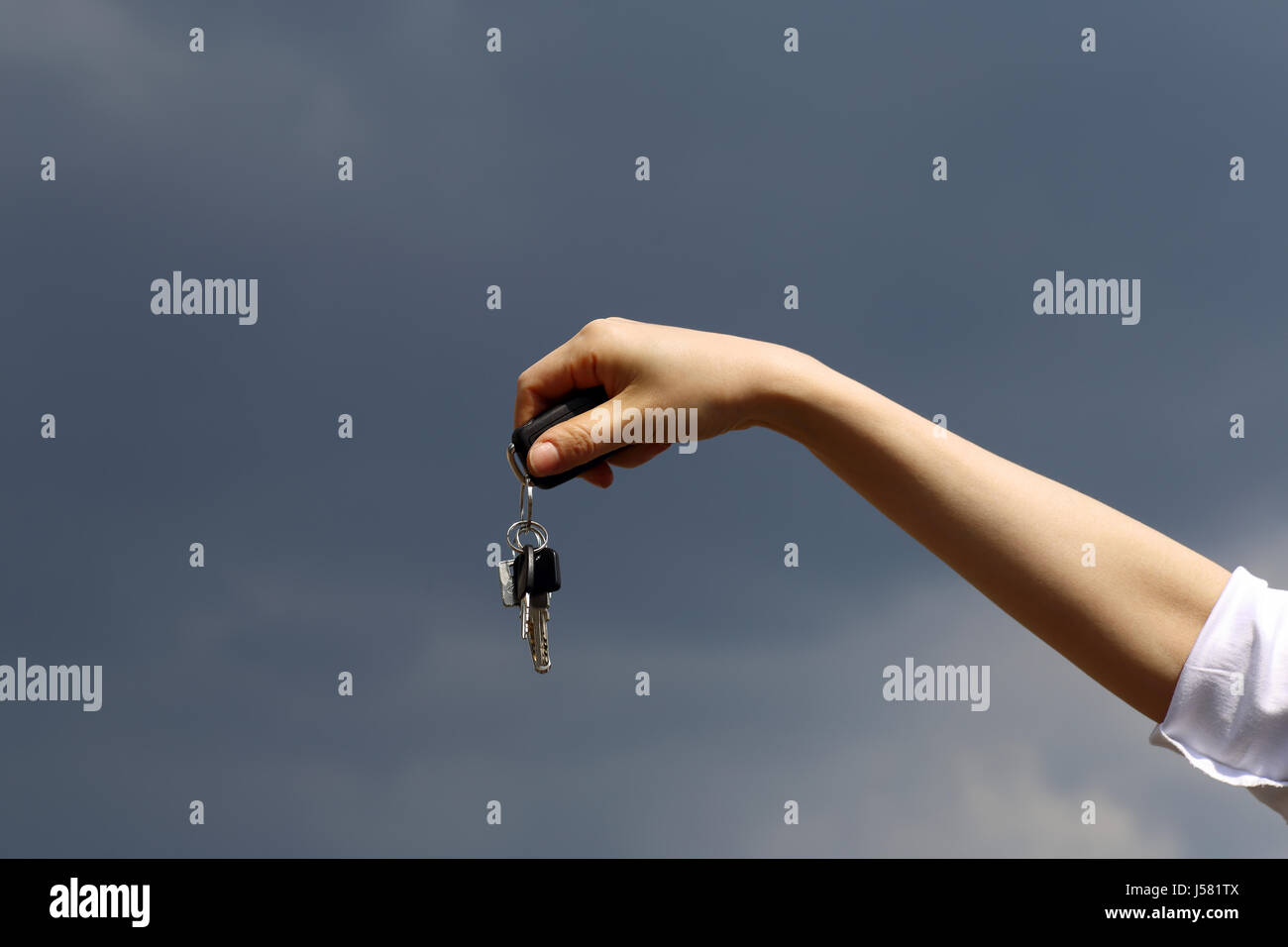 Woman Hand Holding Key Stock Photo - Alamy