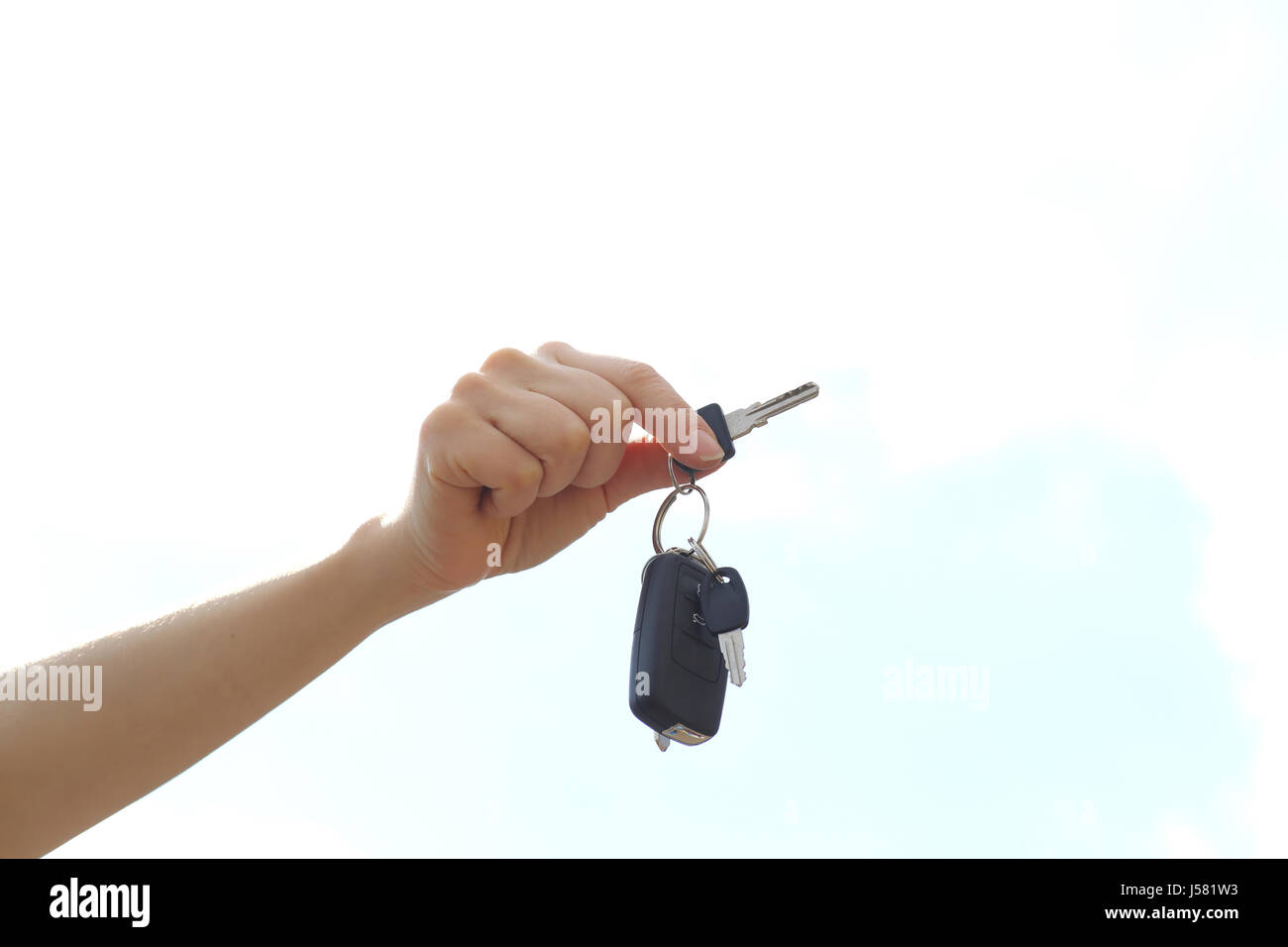 Woman Hand Holding Key Stock Photo - Alamy