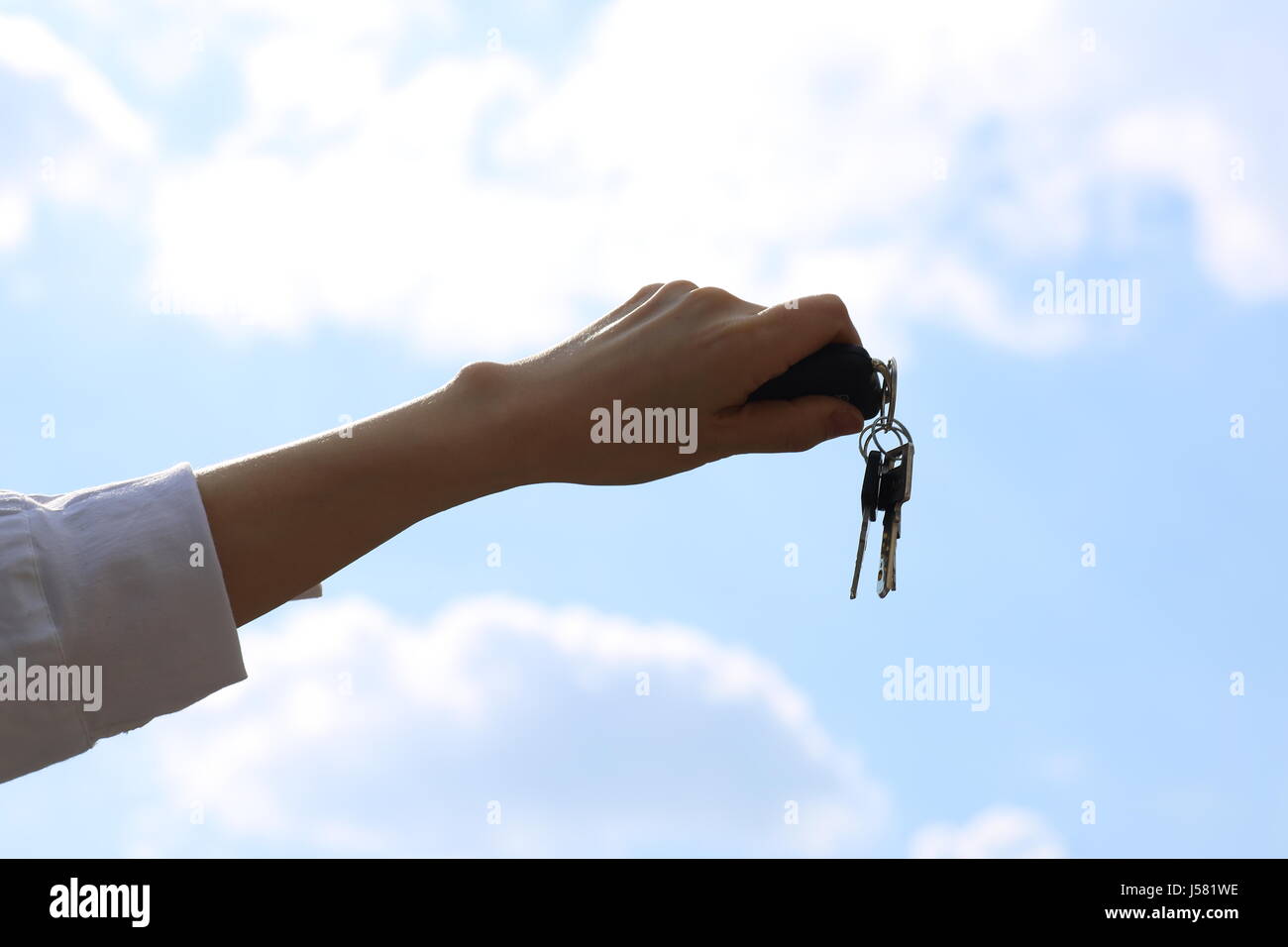 Woman Hand Holding Key Stock Photo - Alamy