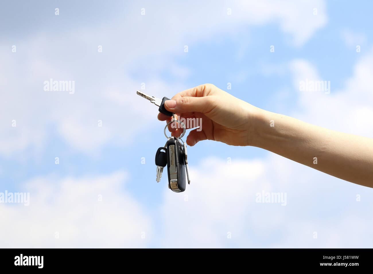 Woman Hand Holding Key Stock Photo - Alamy