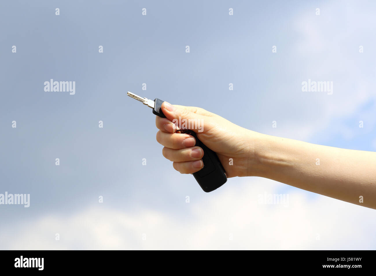 Woman Hand Holding Key Stock Photo - Alamy