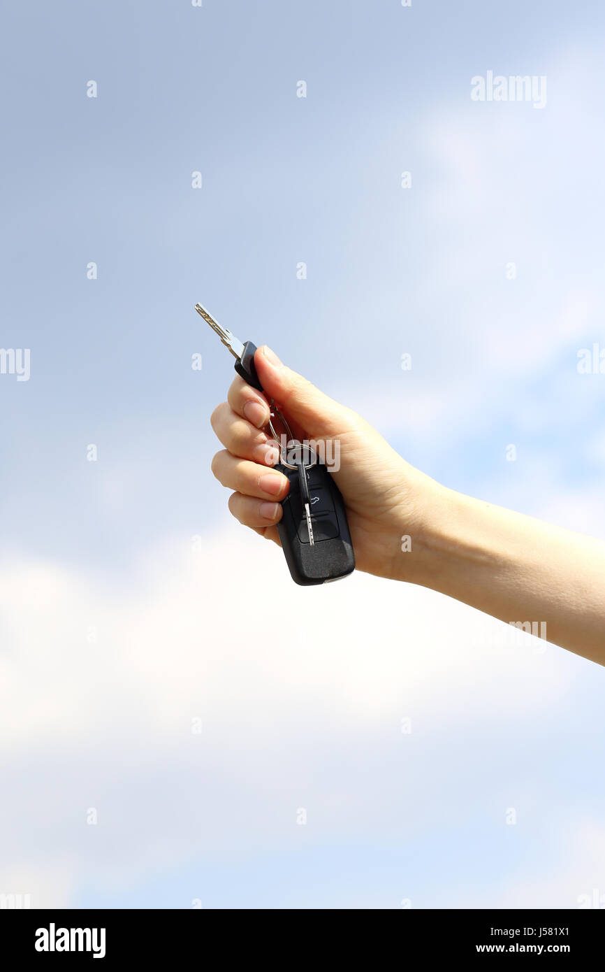 Woman Hand Holding Key Stock Photo - Alamy