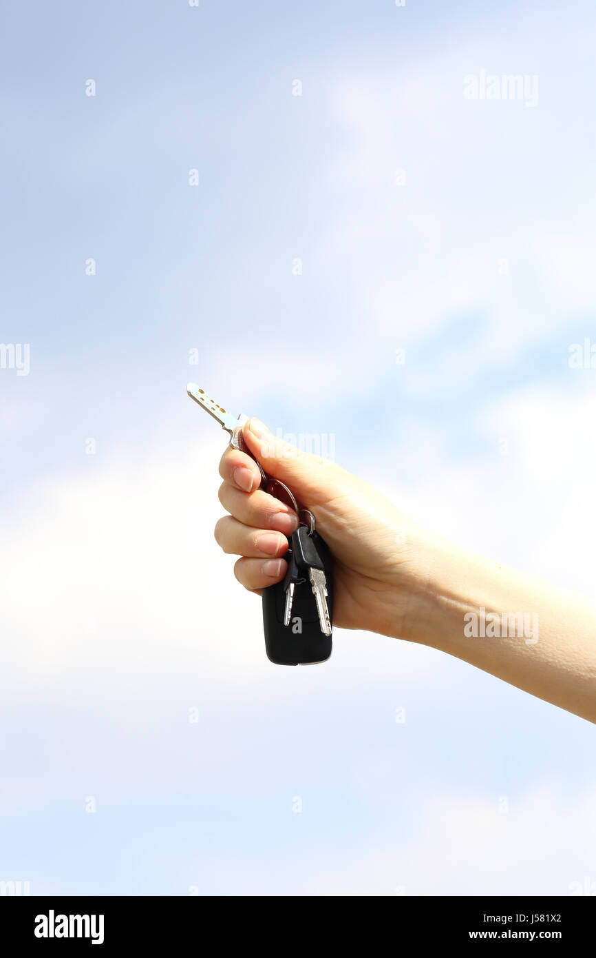 Woman Hand Holding Key Stock Photo - Alamy