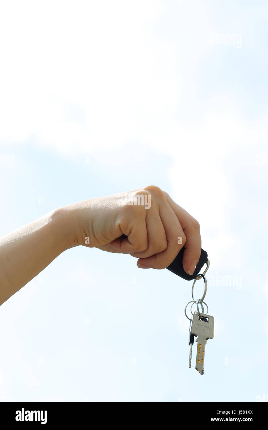 Woman Hand Holding Key Stock Photo - Alamy