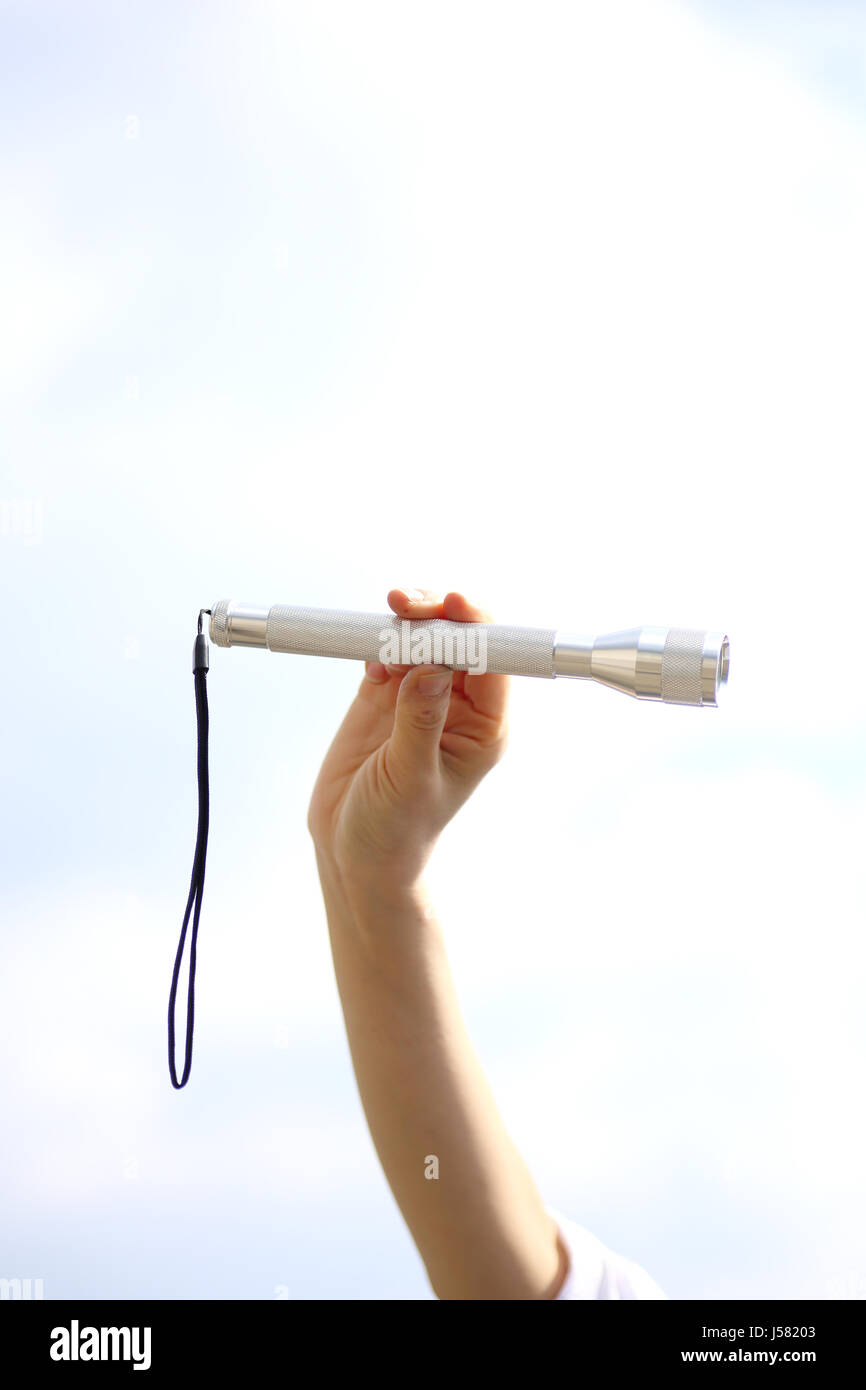 Woman Hand Holding Flashlight Stock Photo - Alamy