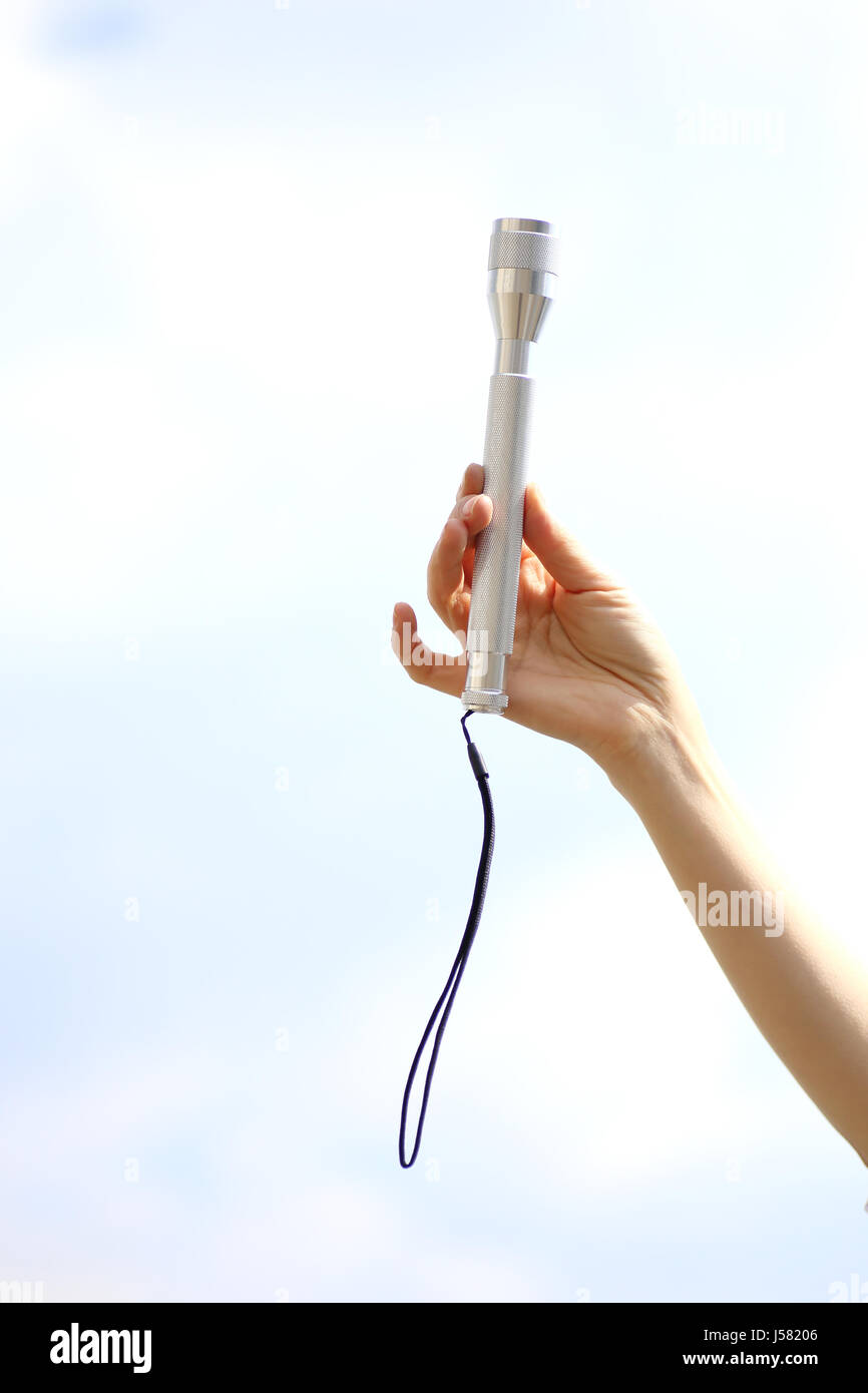 Woman Hand Holding Flashlight Stock Photo - Alamy