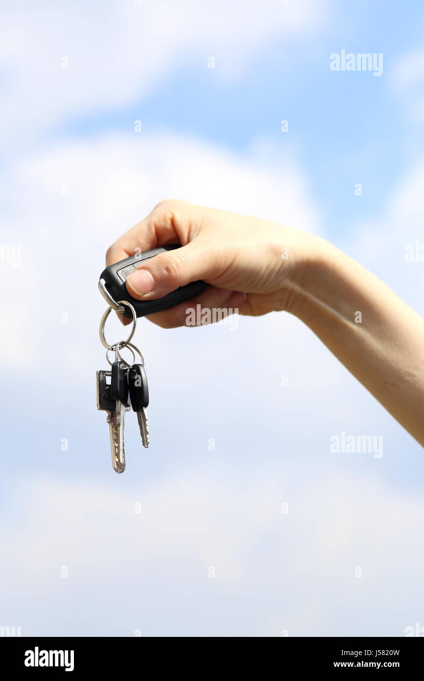 Woman Hand Holding Key Stock Photo - Alamy