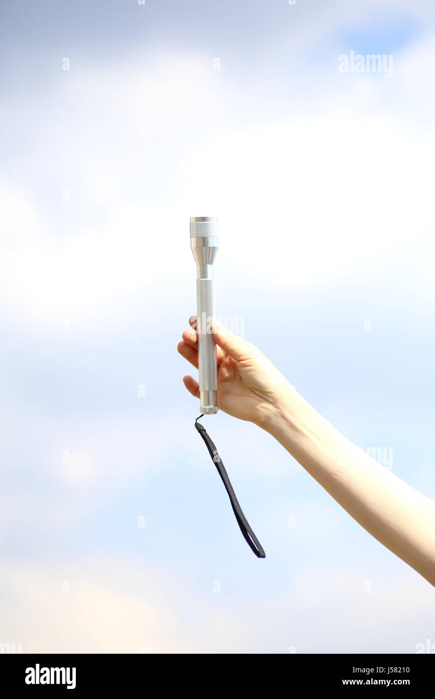 Woman Hand Holding Flashlight Stock Photo - Alamy