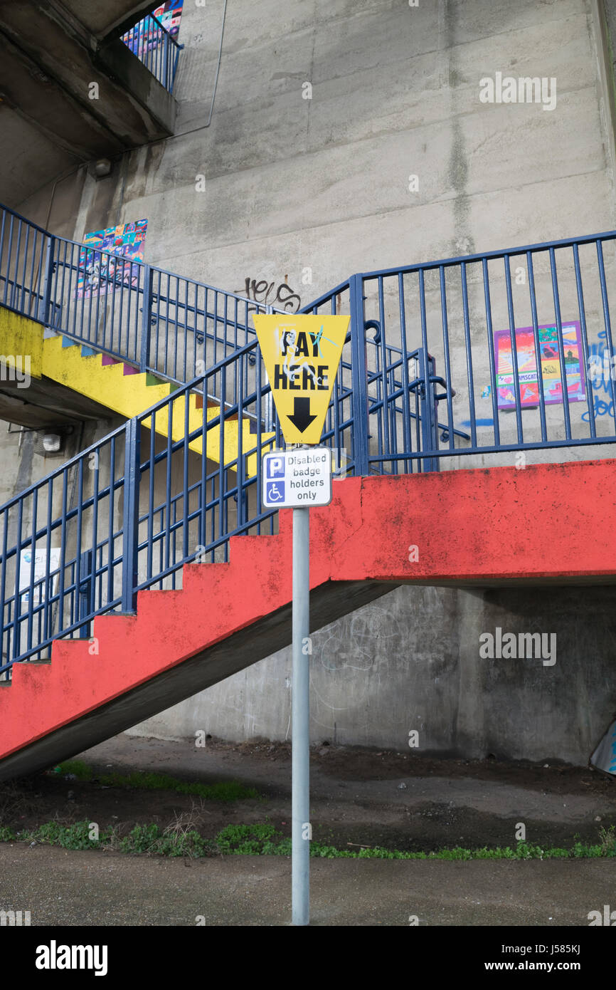 Pay here car park sign with bright steps behind in Ramsgate, Kent Stock ...