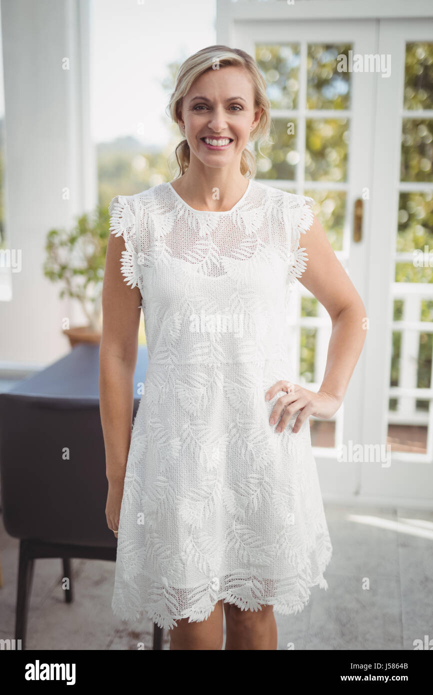 Portrait of beautiful woman standing in restaurant Stock Photo - Alamy