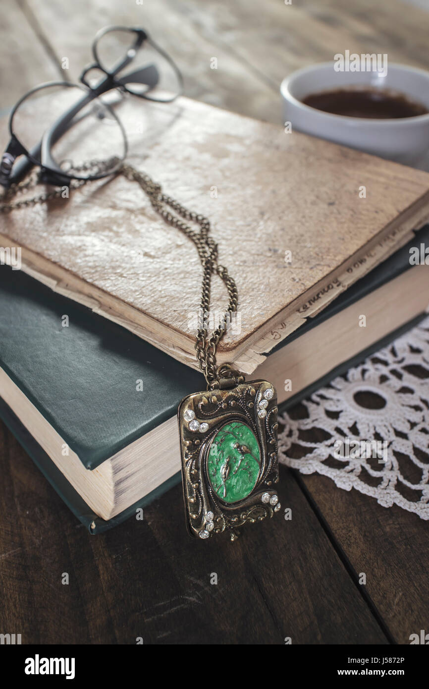 notebook with old necklace, close up Stock Photo - Alamy