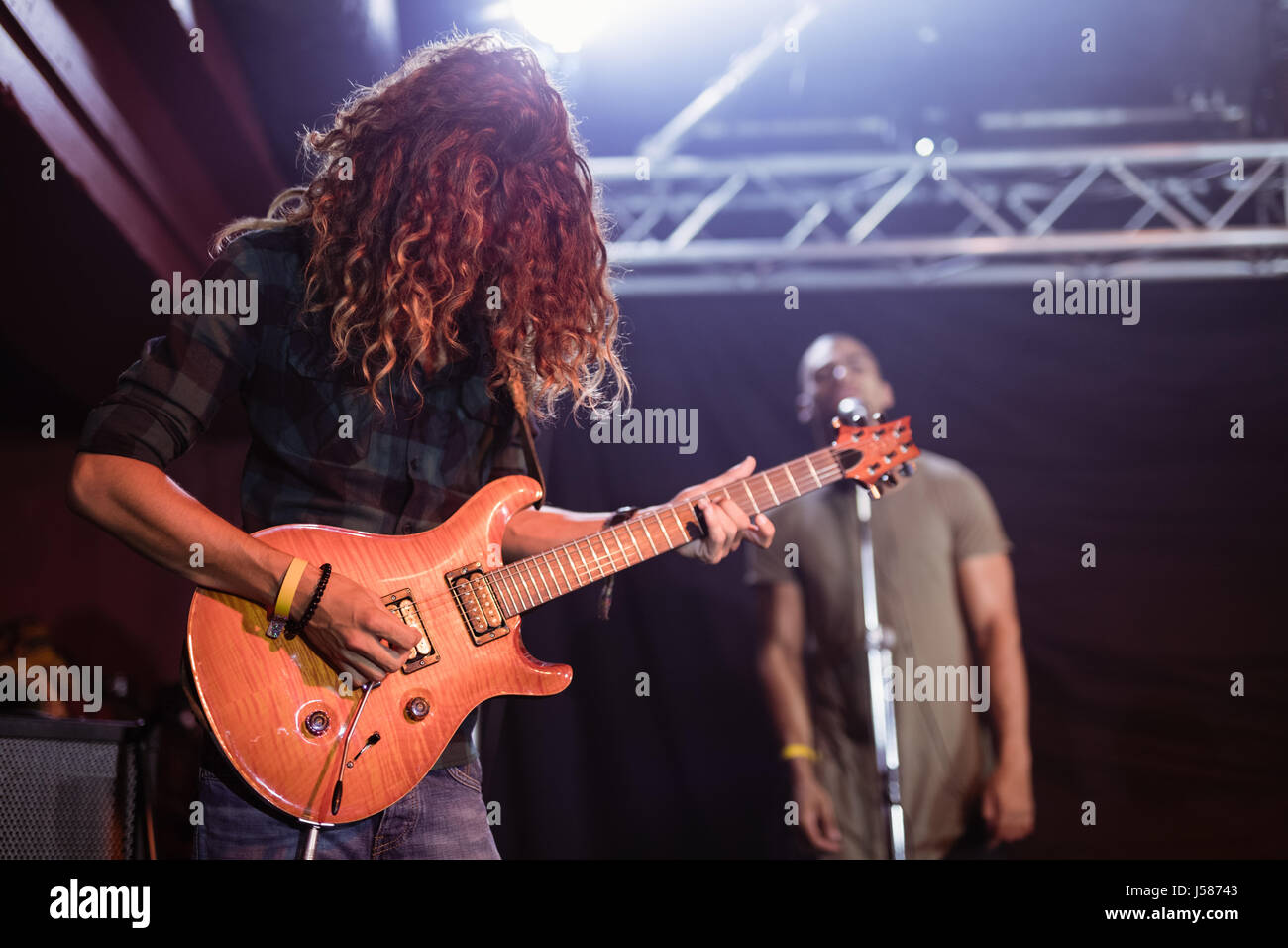 Guitarist musician adult curly hi-res stock photography and images - Alamy