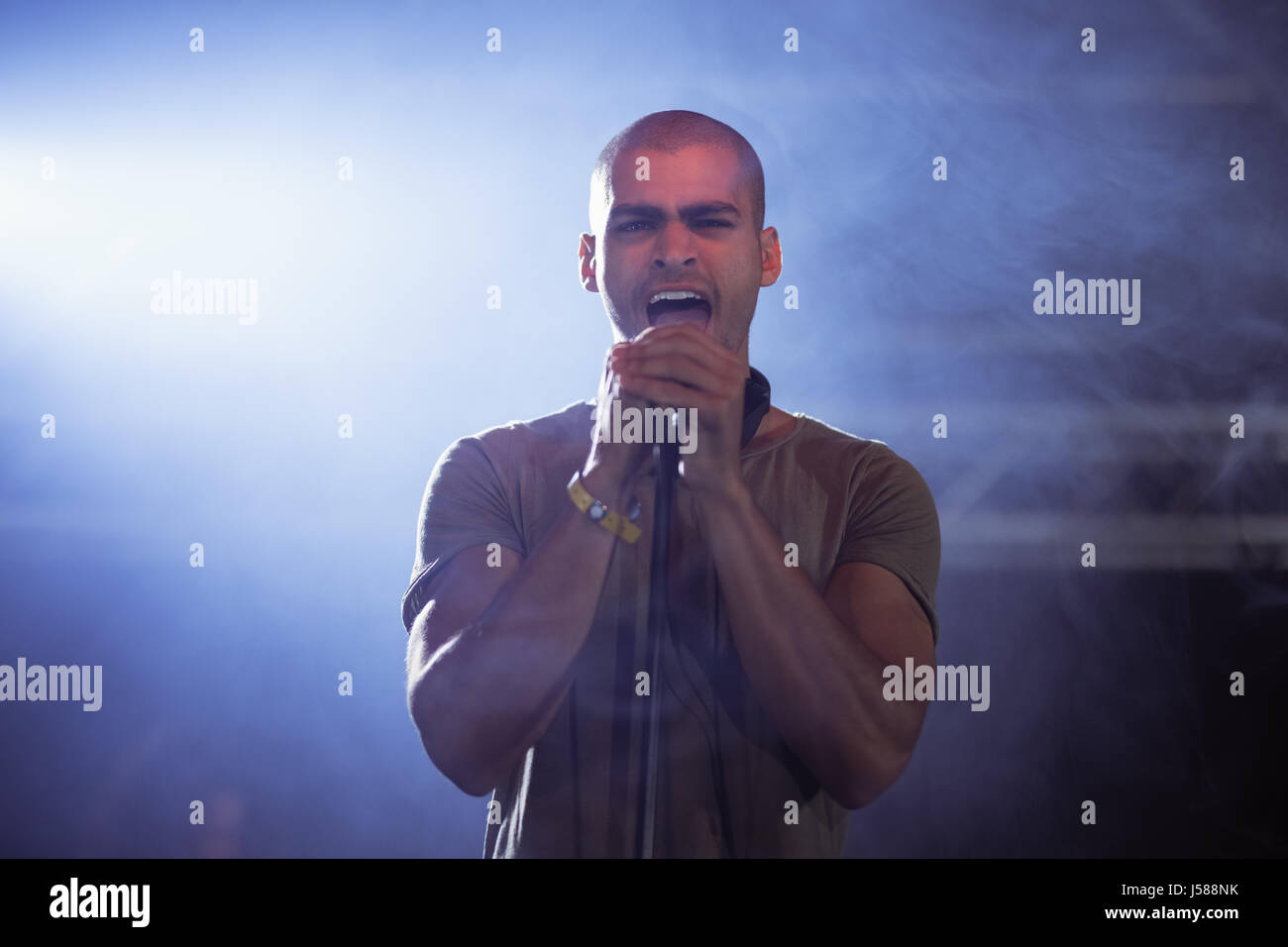 Male singer performing hi-res stock photography and images - Alamy