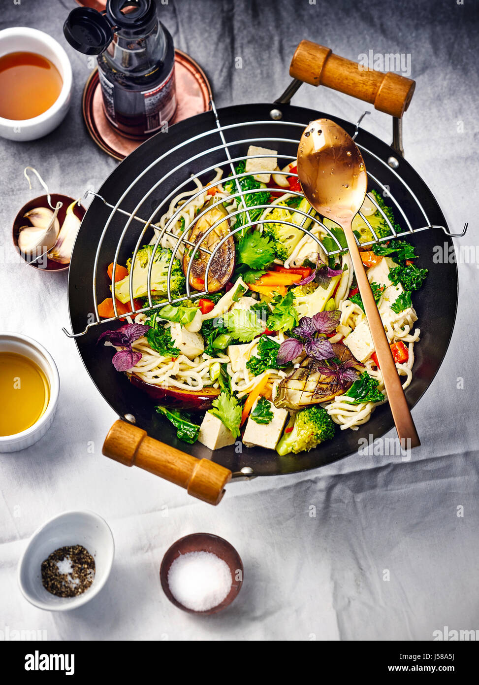 Asian wok dish with noodles and tofu Stock Photo - Alamy