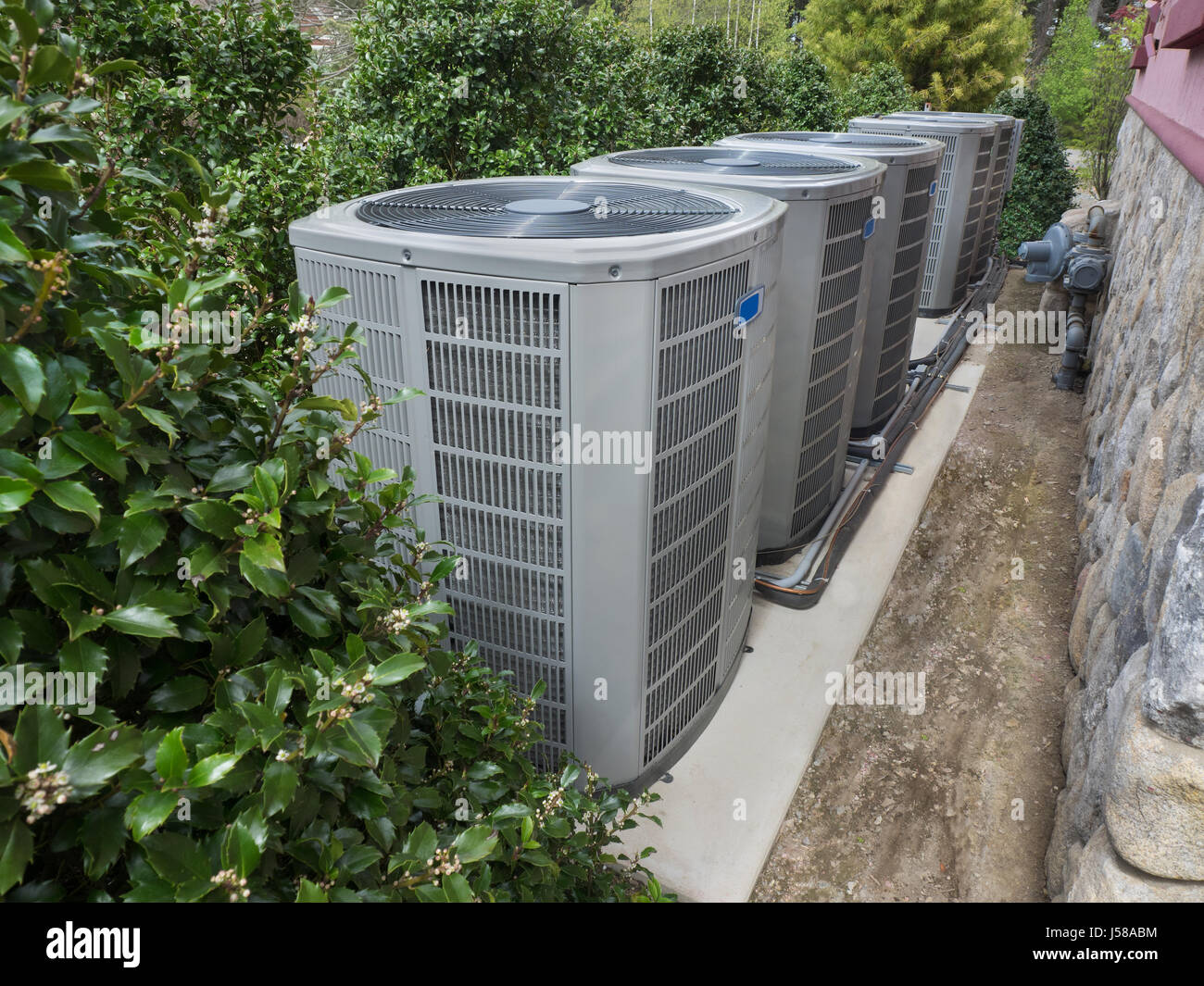Air conditioning and heating pumps Stock Photo - Alamy
