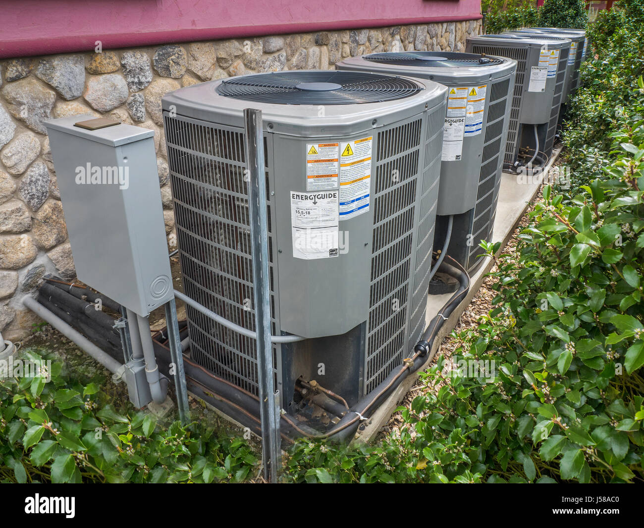 Air conditioning and heating pumps Stock Photo - Alamy