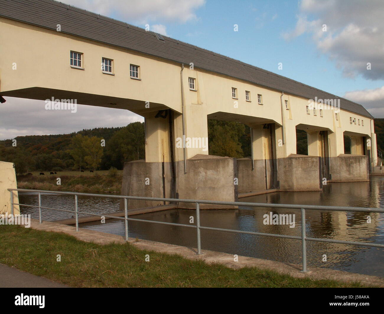 high weir above the trough Stock Photo - Alamy