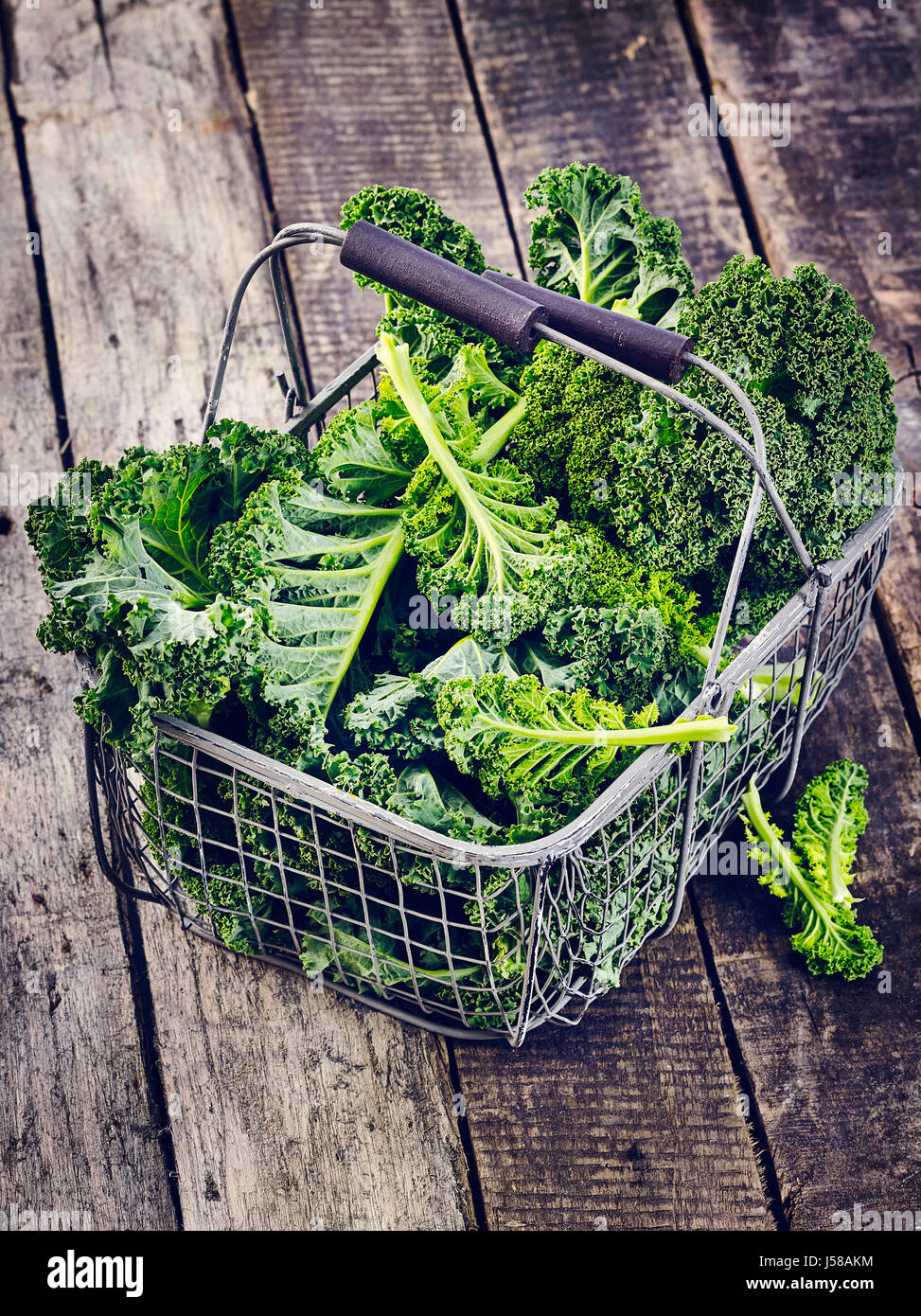 Curly kale in basket hi-res stock photography and images - Alamy