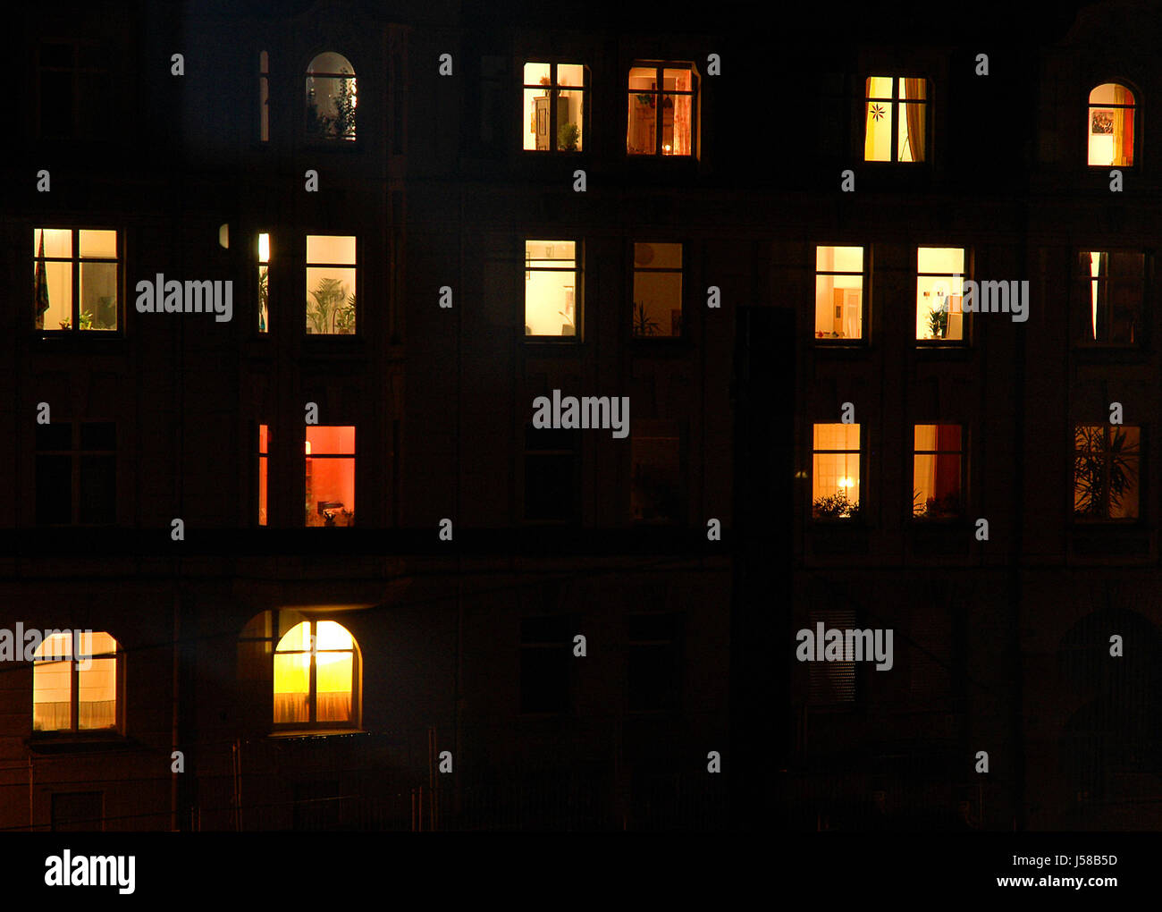 house building window porthole dormer window pane night nighttime ...