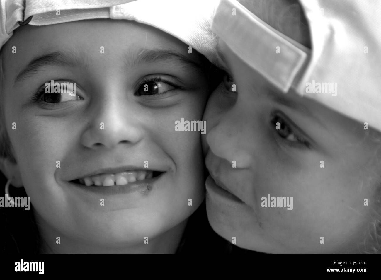 Kids being friends Black and White Stock Photos & Images - Alamy